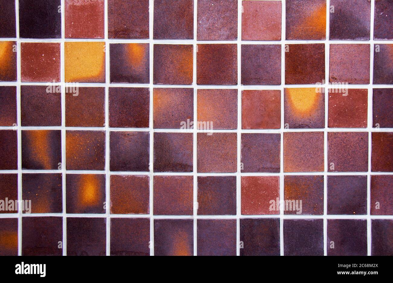 Square layout of bricks side by side - on a wall. The front of the ...