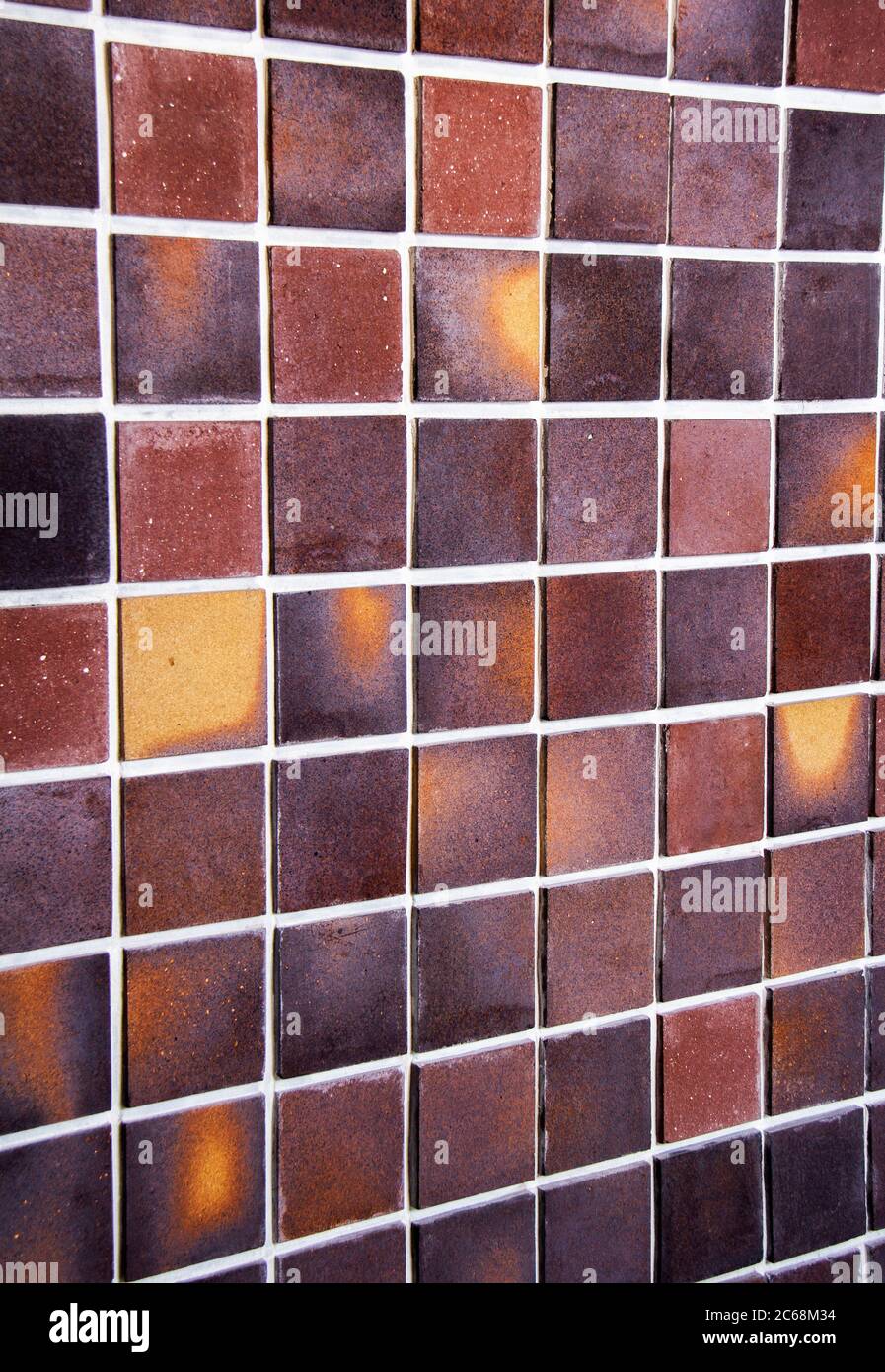 Square layout of bricks side by side - on a wall. The front of the ...