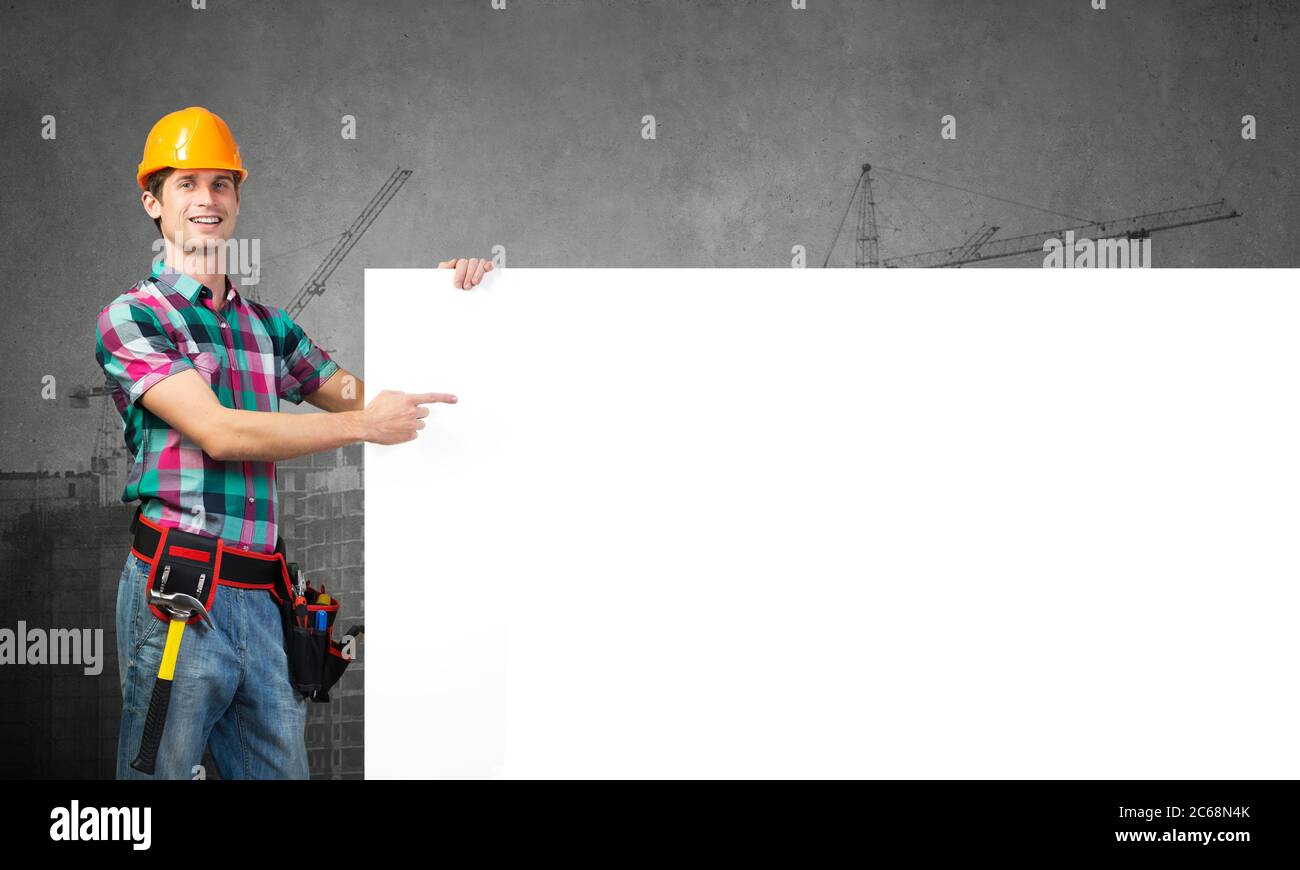 Repairman demonstrating banner Stock Photo - Alamy