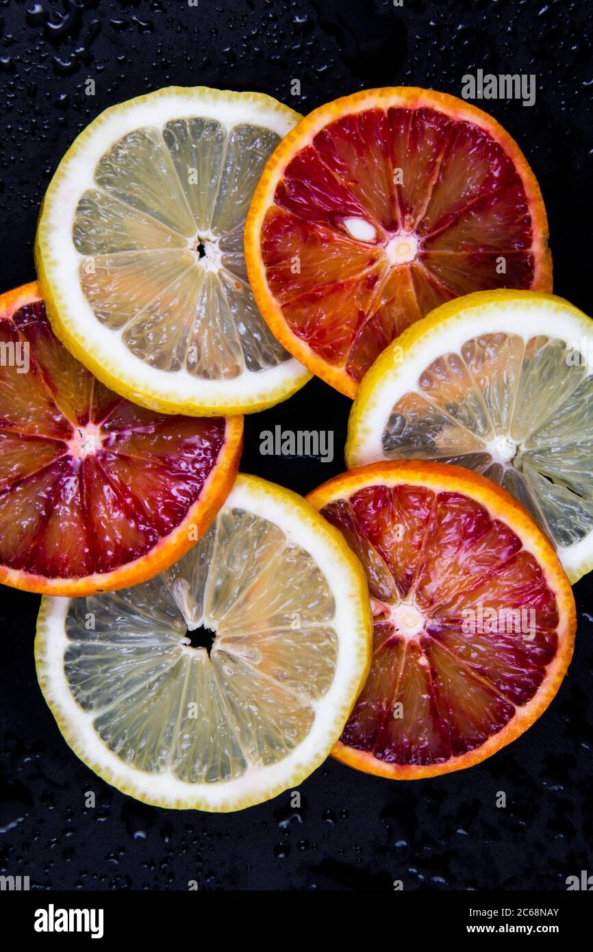 Slice of a blood orange hi-res stock photography and images - Alamy