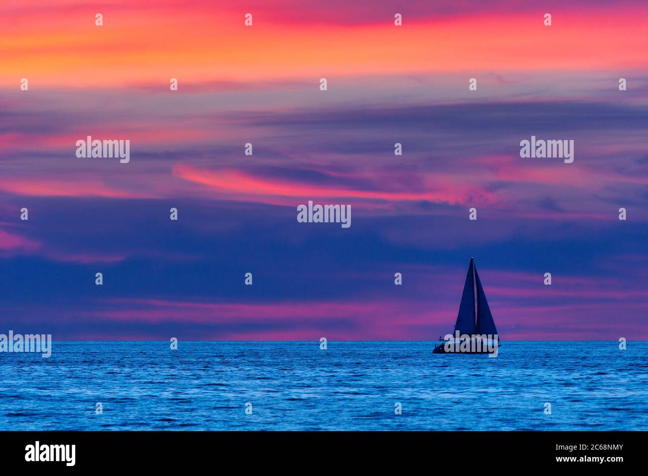 Sailing boat sea sky sunrise night hi-res stock photography and images ...