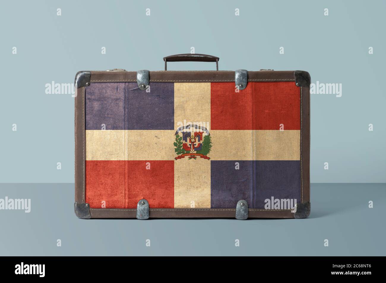 Dominican Republic flag on old vintage leather suitcase with national ...