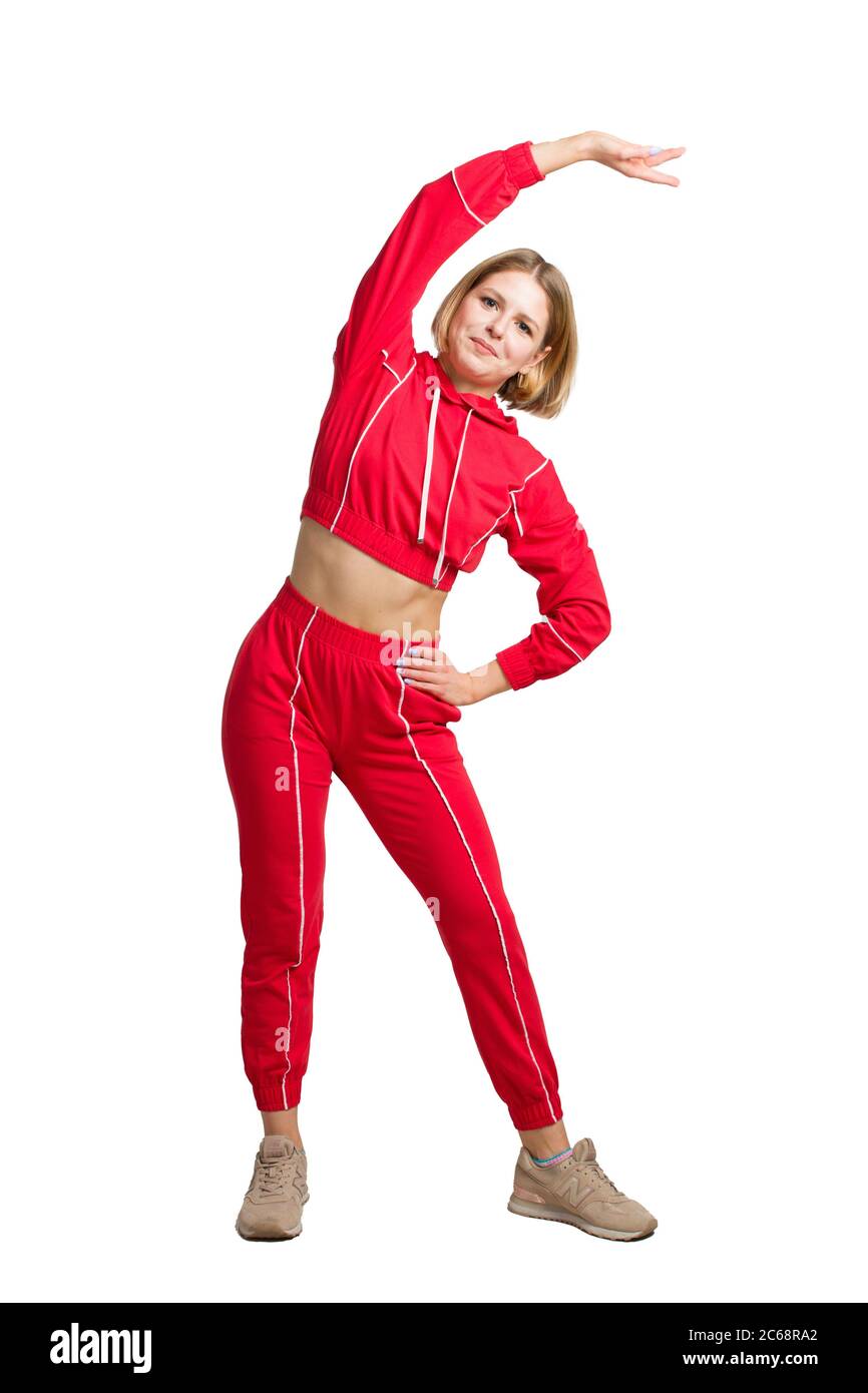 Young Fitness woman in red training dress. Isolate on white background ...