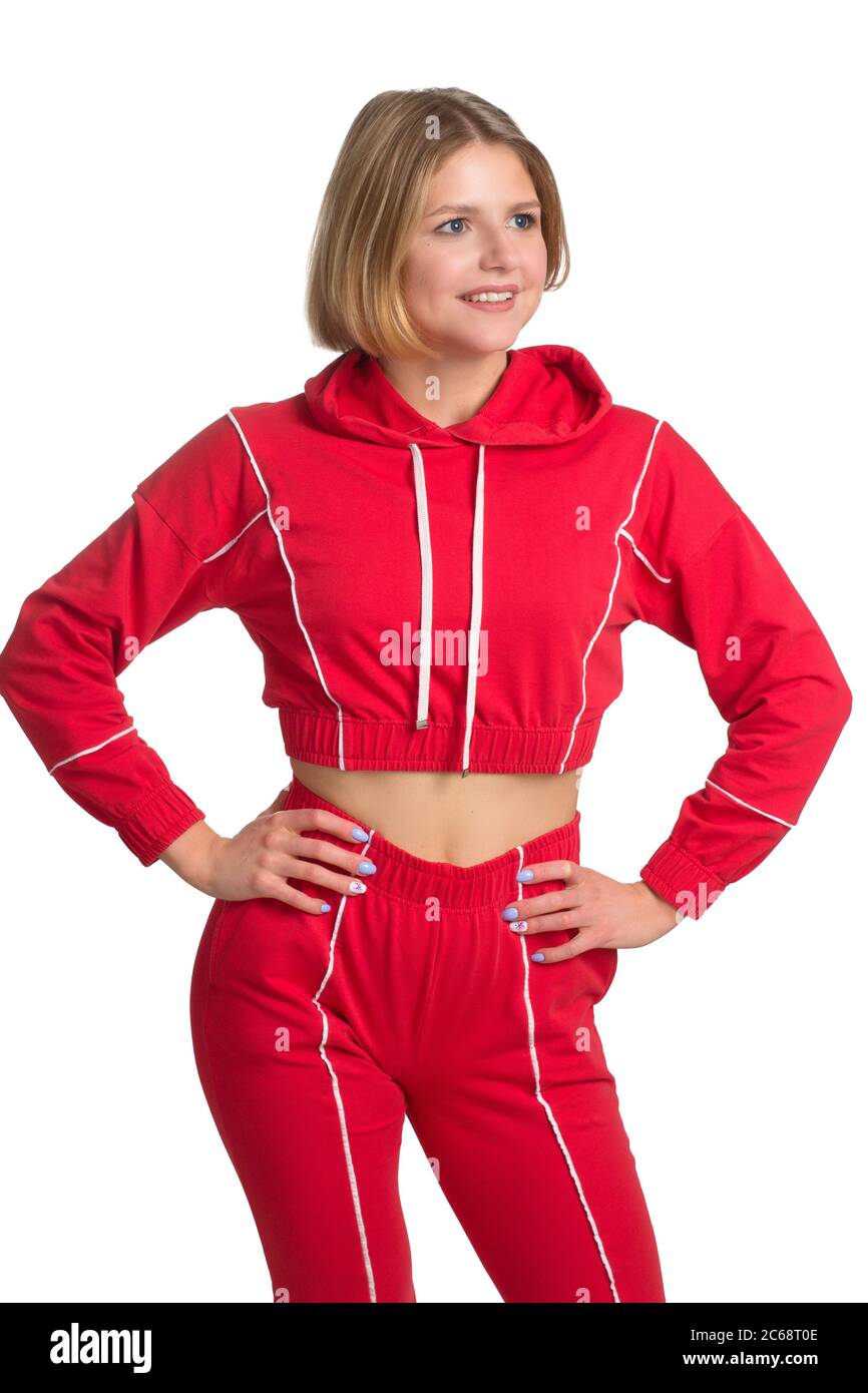 Young Fitness woman in red training dress. Isolate on white background ...