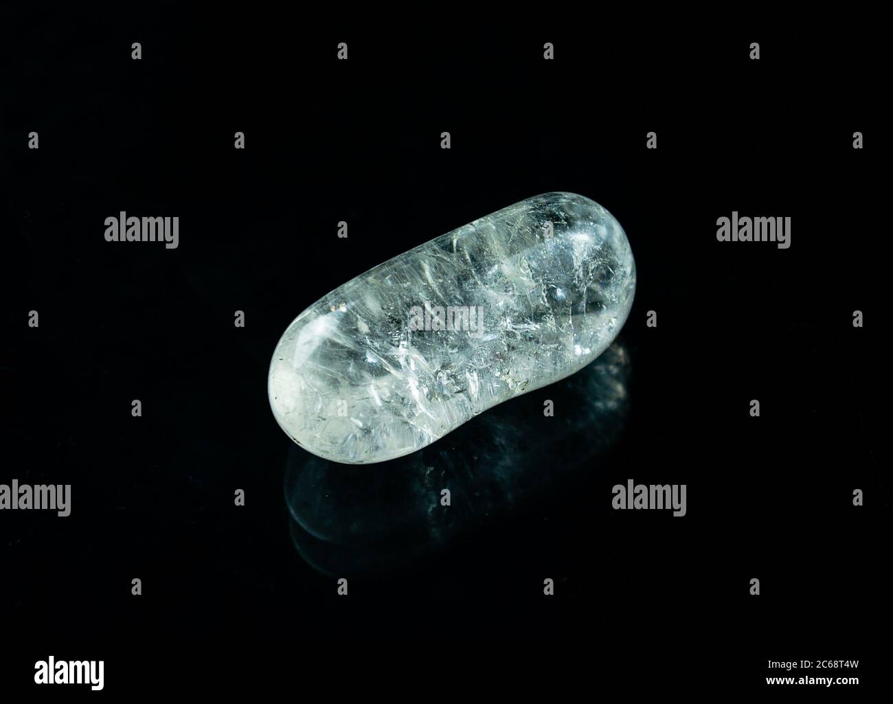 An almost water-clear rock crystal with beautiful inclusions Stock ...