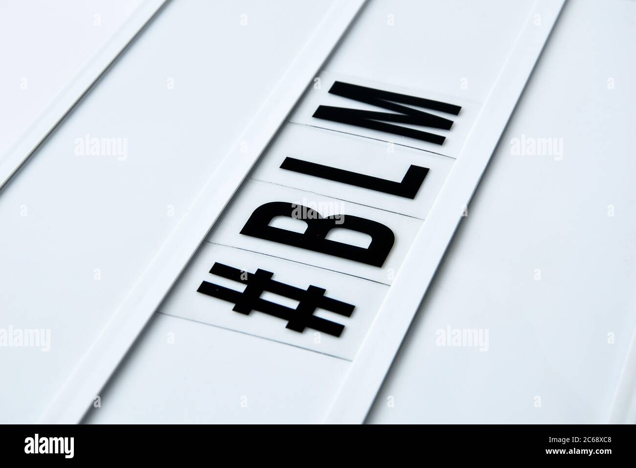 hashtag BLM BLACK LIVES MATTER text on a white background. Protest ...