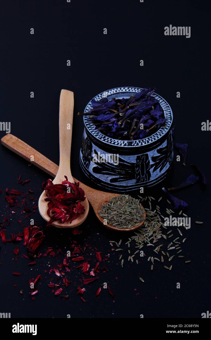 Citrus aurantium, cardamom, cumin and hibiscus tea Stock Photo - Alamy