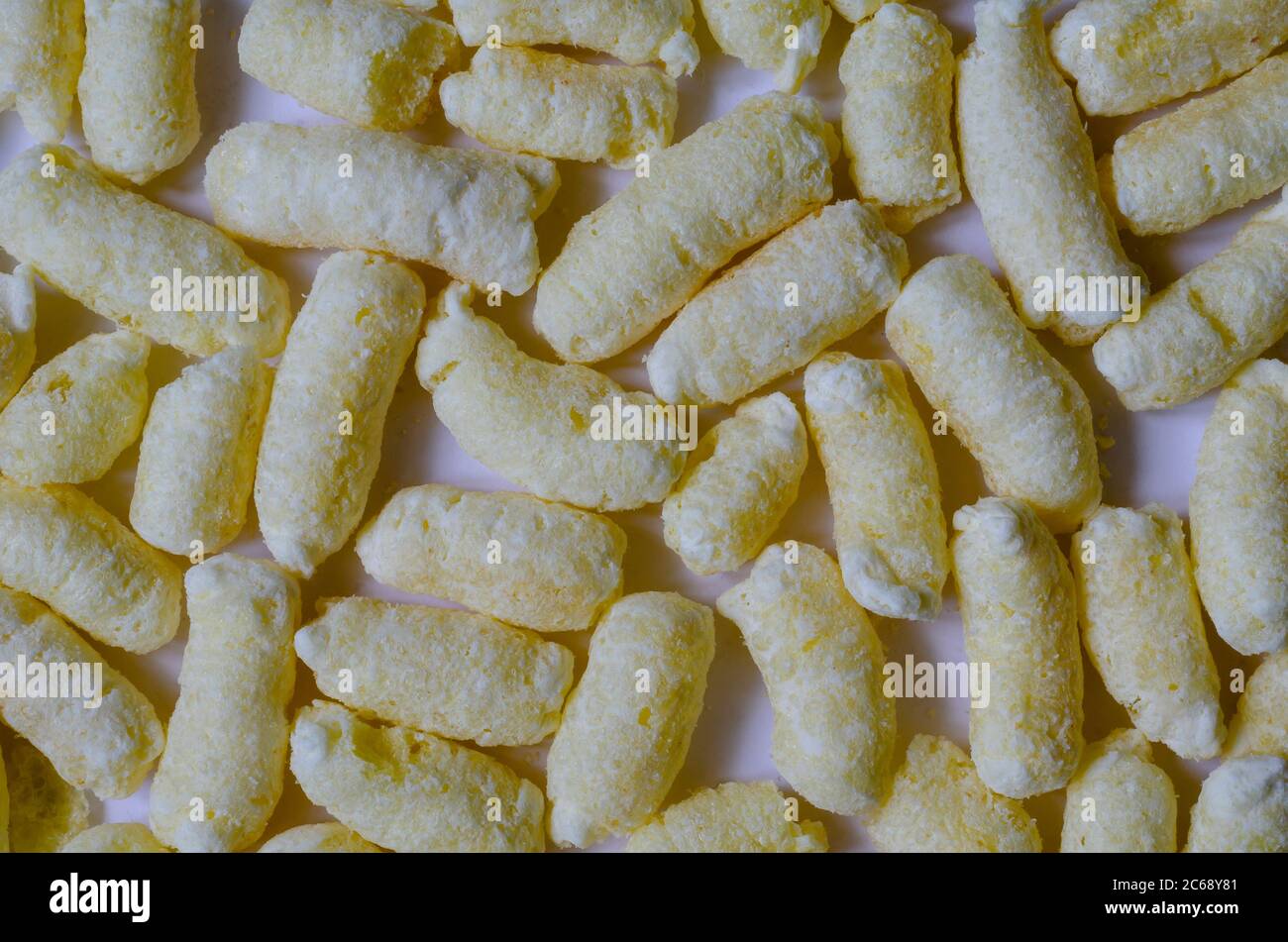 Airy Crisps, Corn Puffs, Puffcorn Snacks Background. Detailed shot of ...