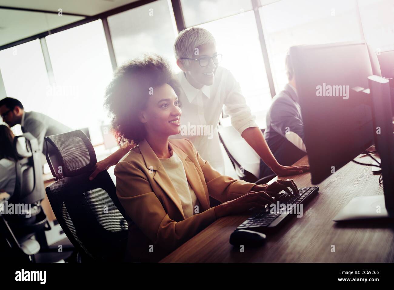 Programmer working in a software developing company Stock Photo - Alamy