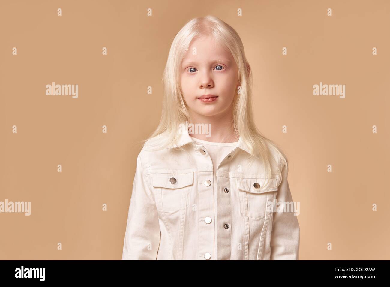 portrait of awesome albino kid with blonde hair. Fashion style and ...