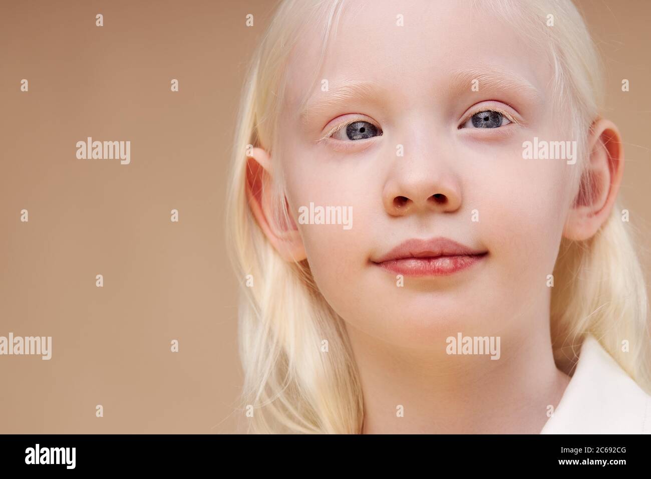 portrait of awesome albino kid with blonde hair. Fashion style and ...