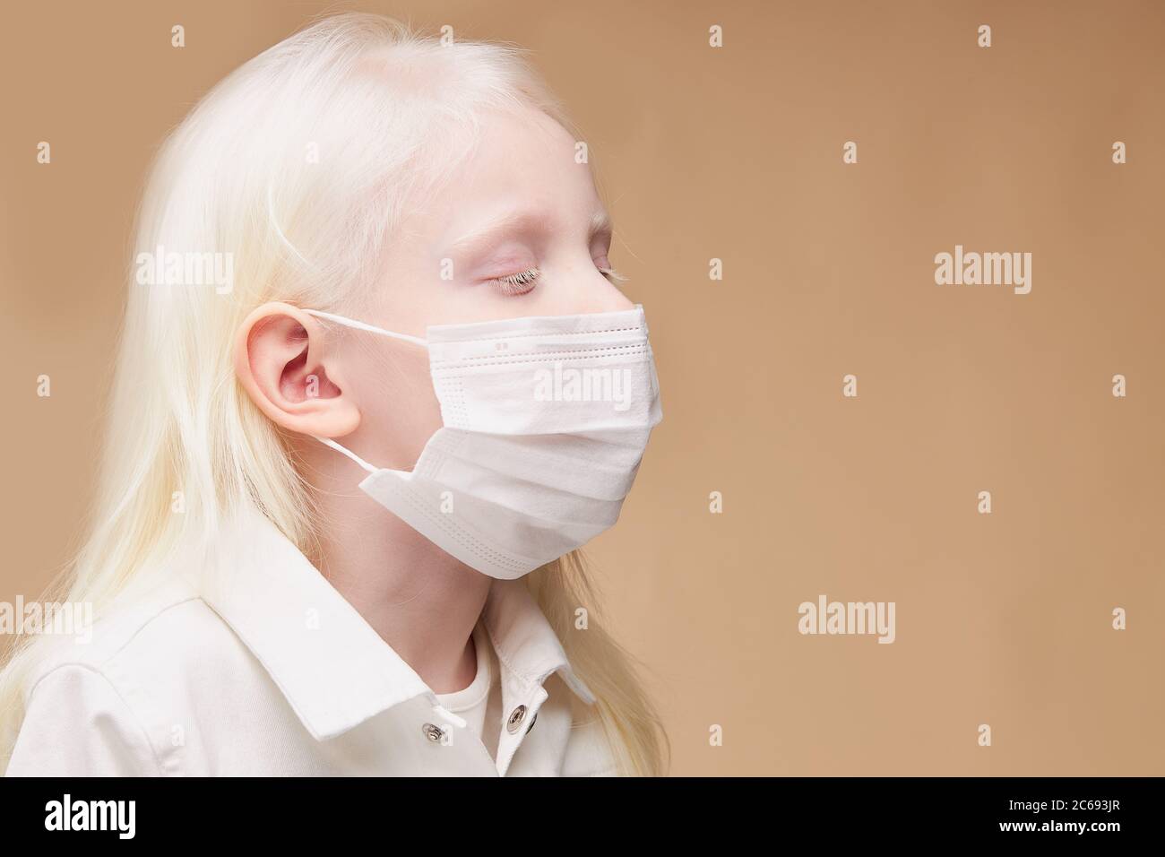 portrait of sick mystic albino child in medical mask isolated, gorgeous ...