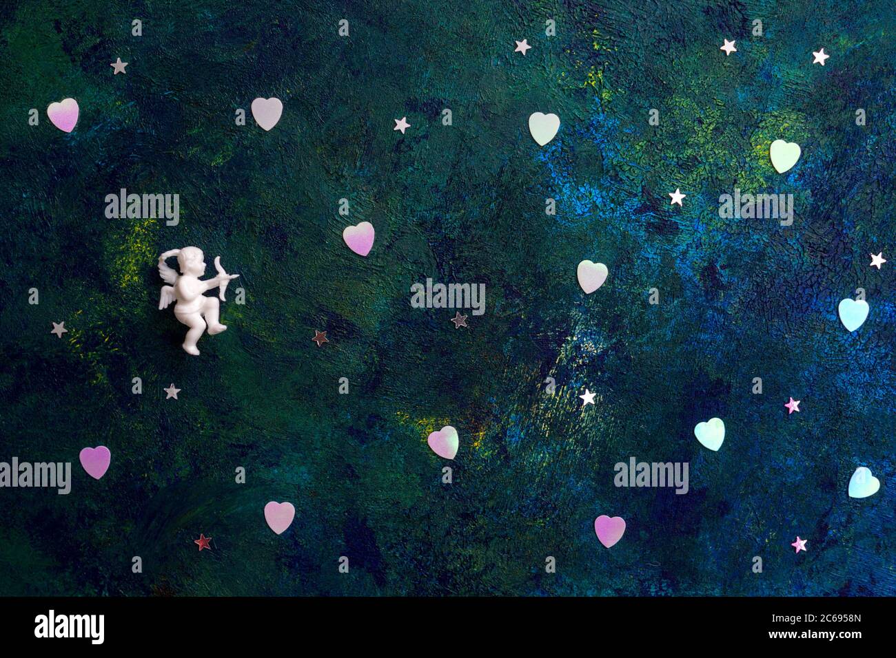 Valentines day concept. Cupid and pink hearts and stars. As cosmos ...