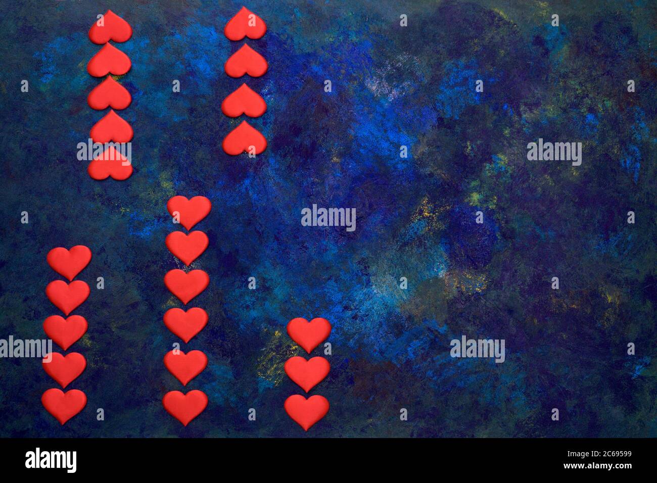 Blue oil paint mixed. Columns of hearts. Valentines day concept Stock ...