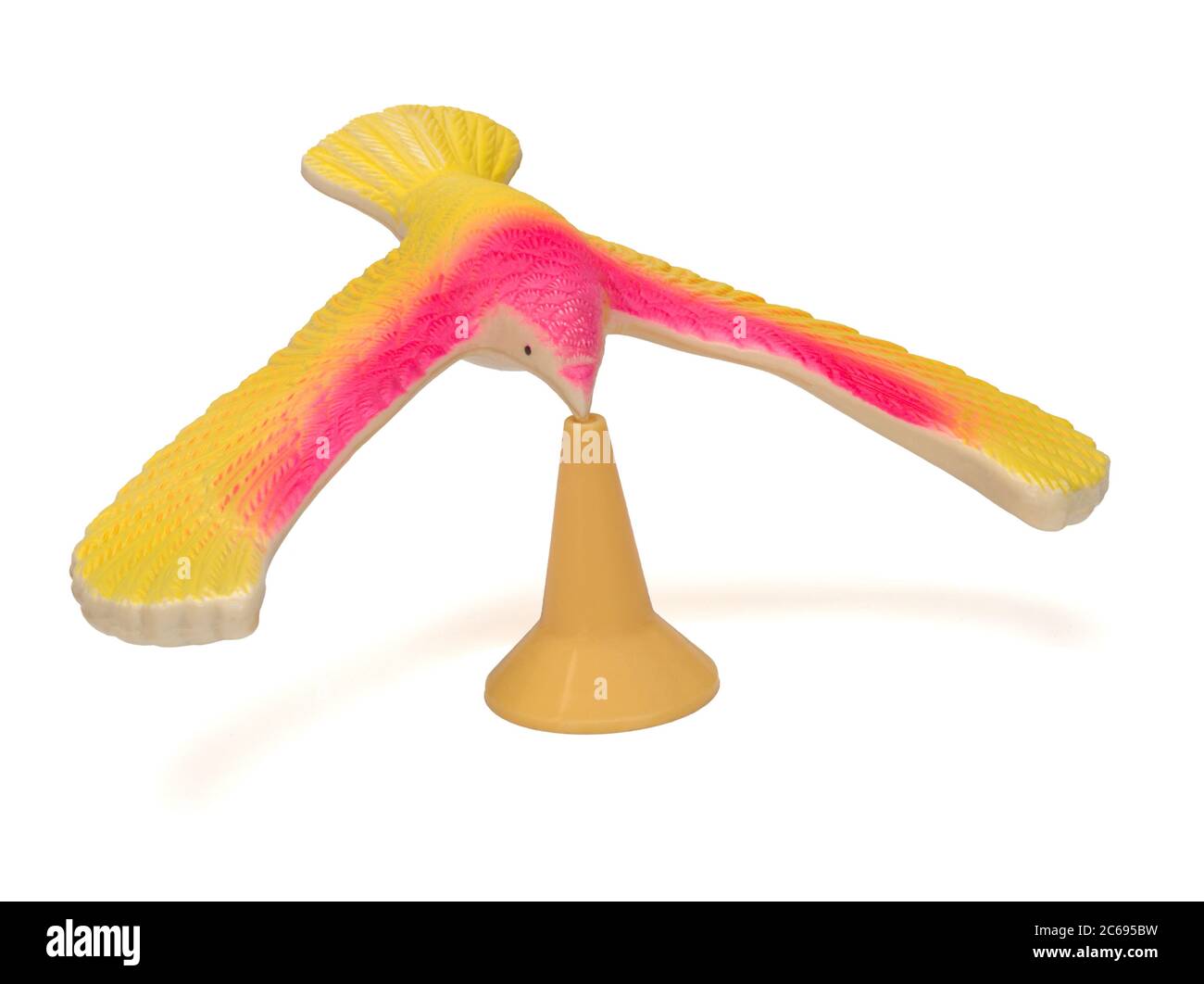 Balance bird on a white background, educational toy Stock Photo - Alamy