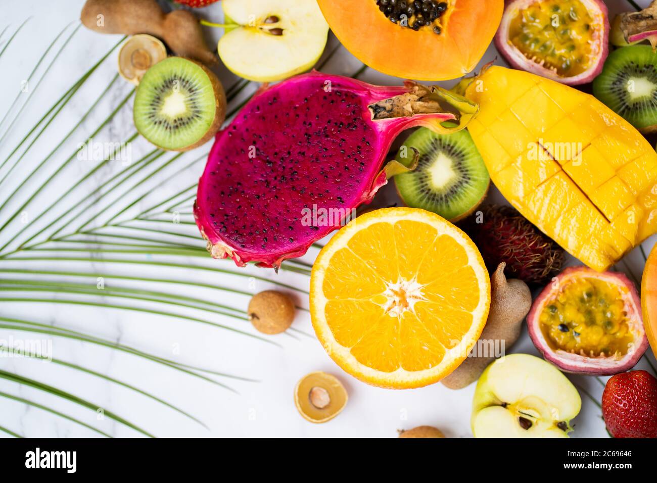 Set of exotic tropical fruits. Papaya, mango, dragon fruit, passion ...