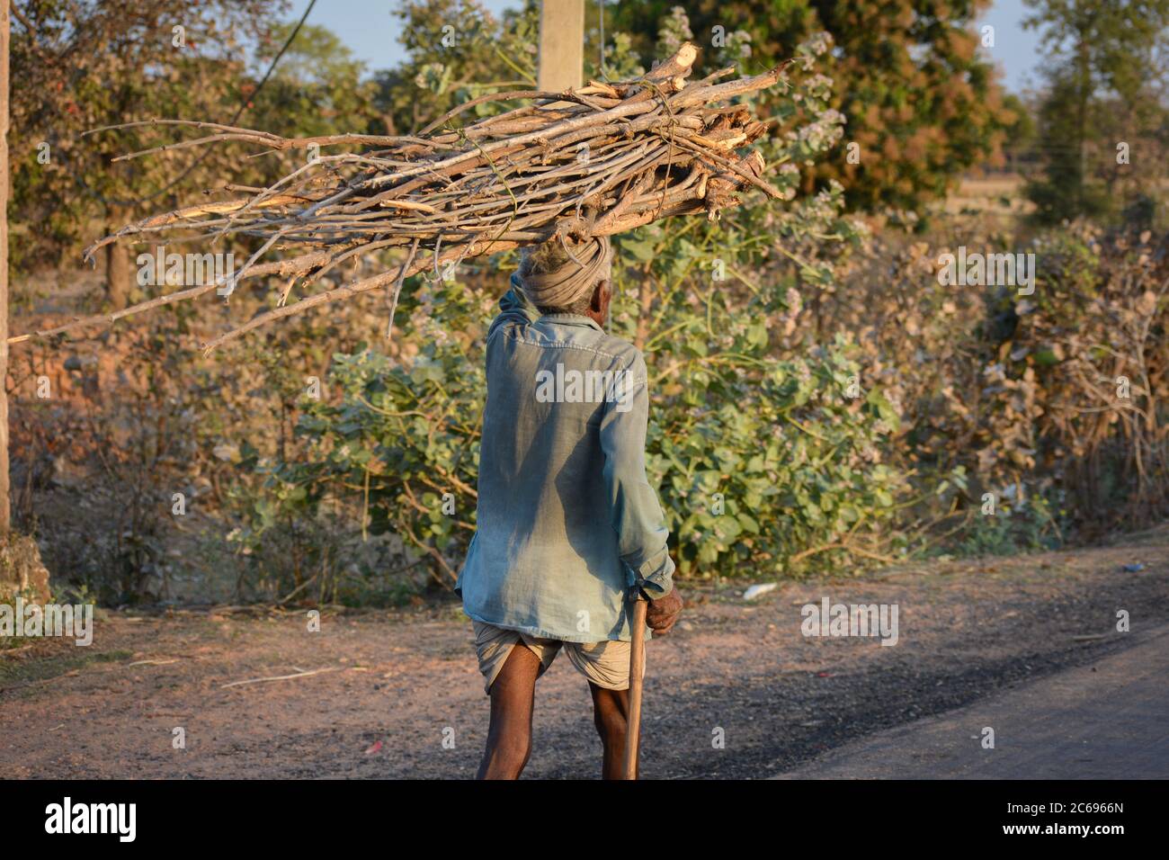 Old man carrying heavy load hi-res stock photography and images - Alamy