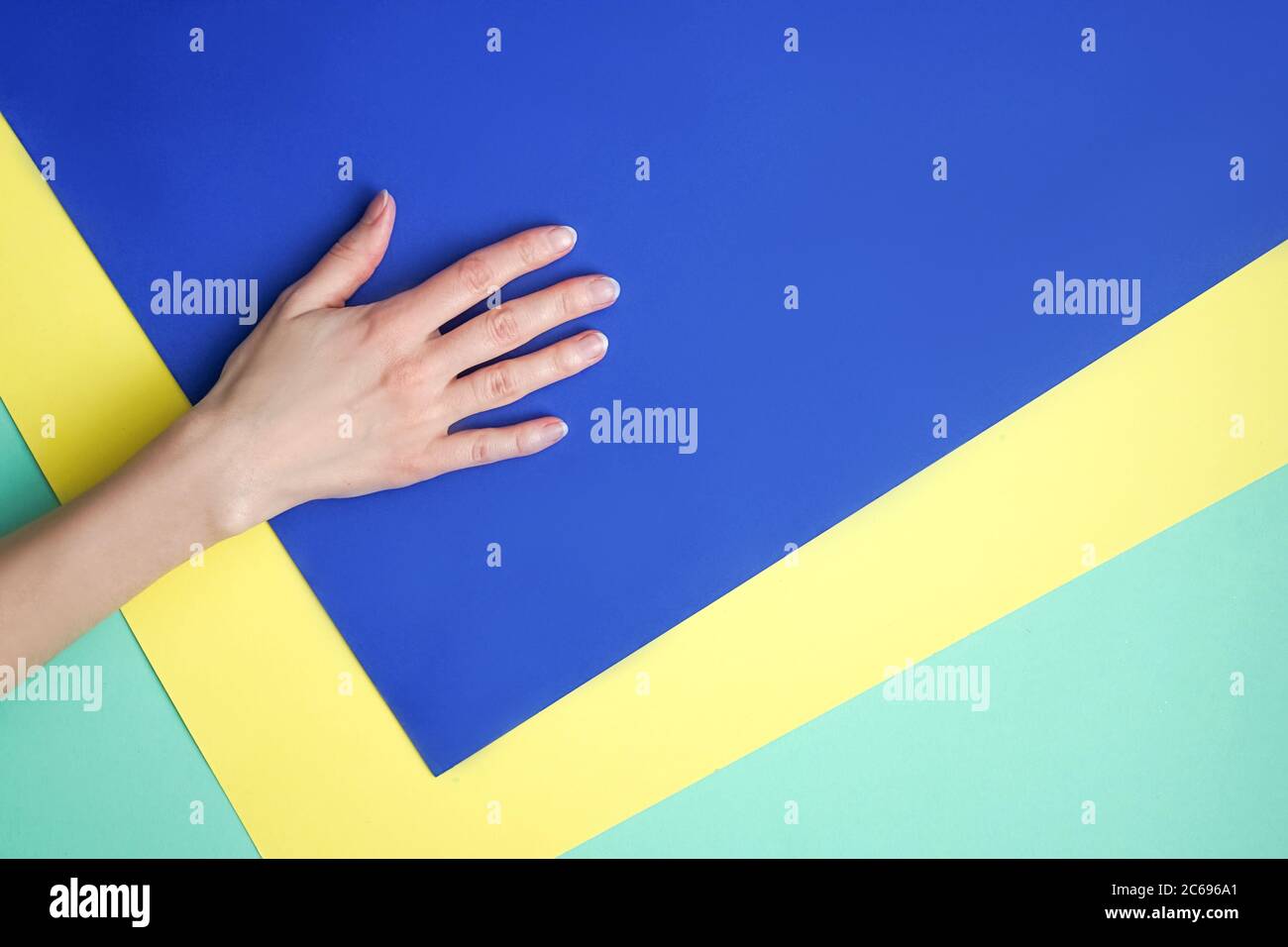 Woman's hand on colorful background. Layout for advertisement Stock ...