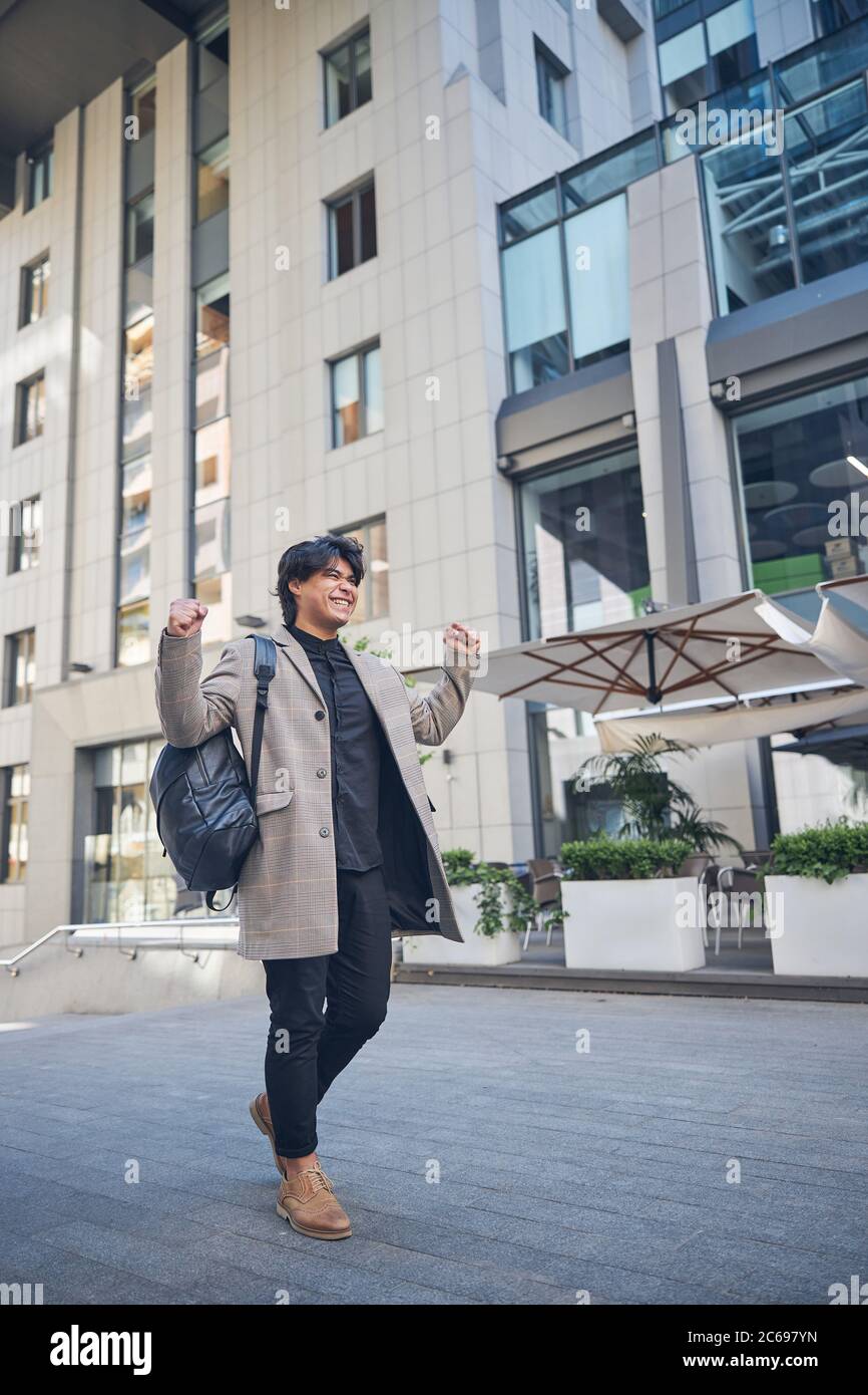 Excited young man walk on hi-res stock photography and images - Alamy