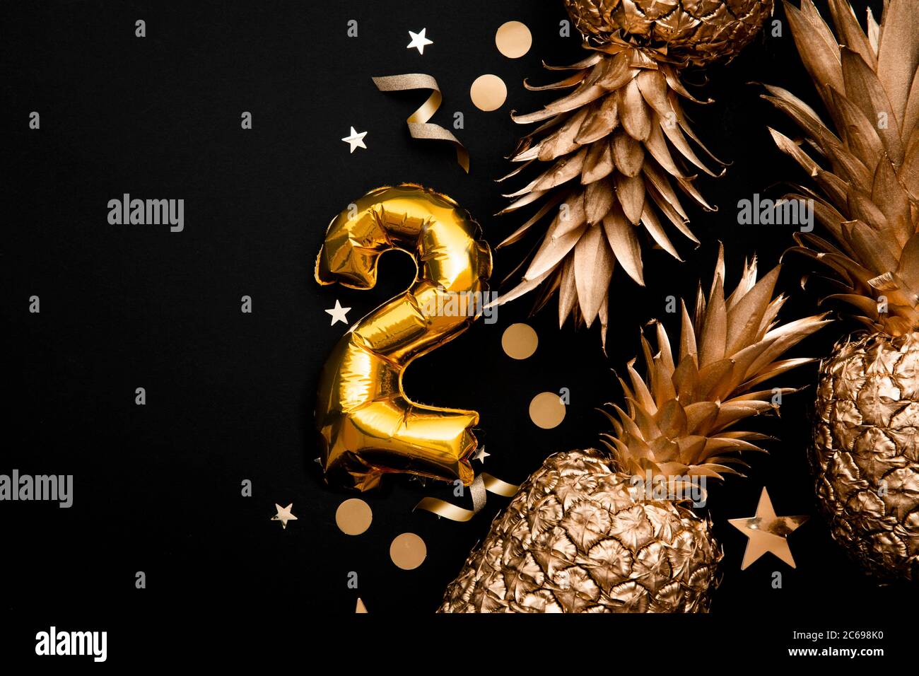 2nd birthday celebration background with gold balloons and golden ...