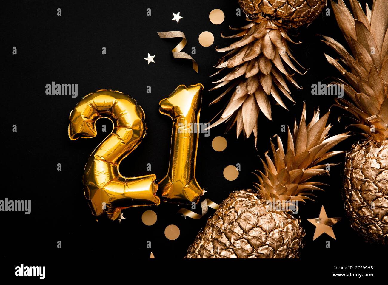 21st birthday celebration background with gold balloons and golden ...