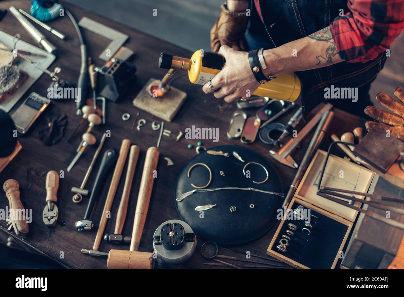 man creating a jewellery at workshop . close up top view photo Stock ...
