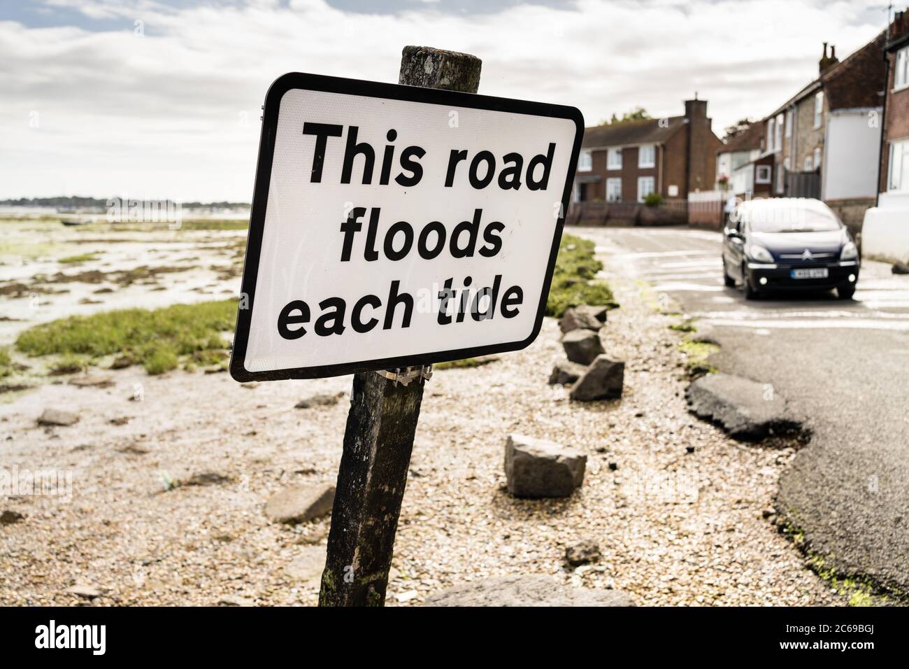 Road sign in Bosham East Sussex warning of tidal road flooding Stock ...