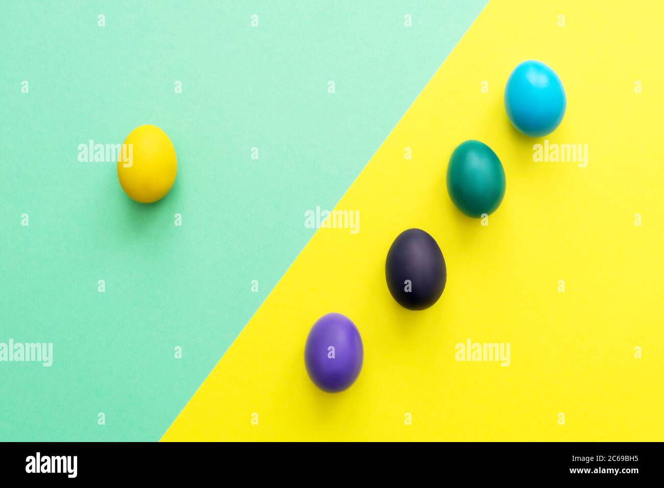 Color easter eggs over mint and yellow. Easter hipster concept Stock ...