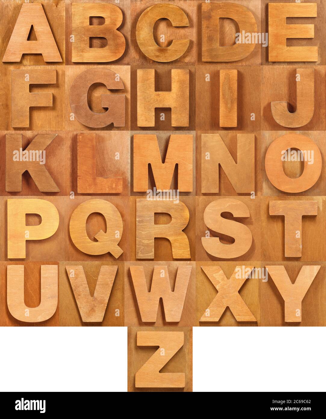 Wooden alphabet font on brown wooden background Stock Photo - Alamy