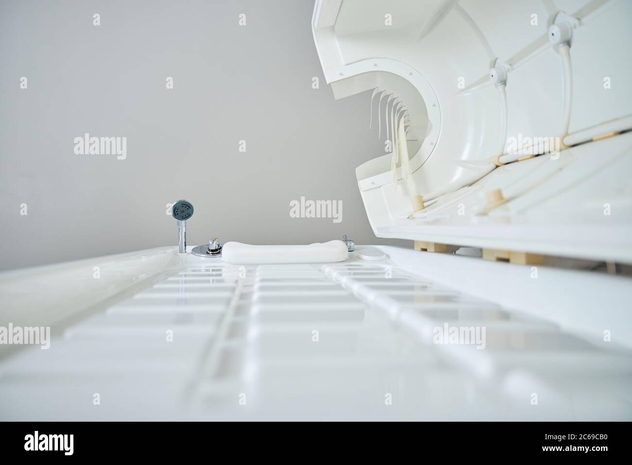 Spacious spa capsule in beauty salon designed in white color Stock ...