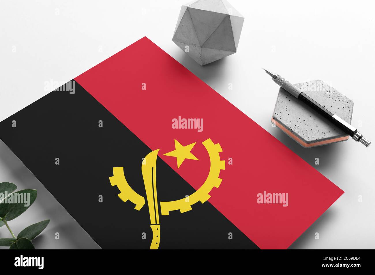 Angola flag on minimalist paper background. National invitation letter ...