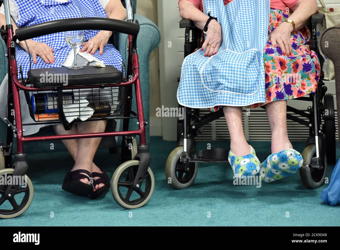 older people care home zimmer frame slippers feet sitting caring ...