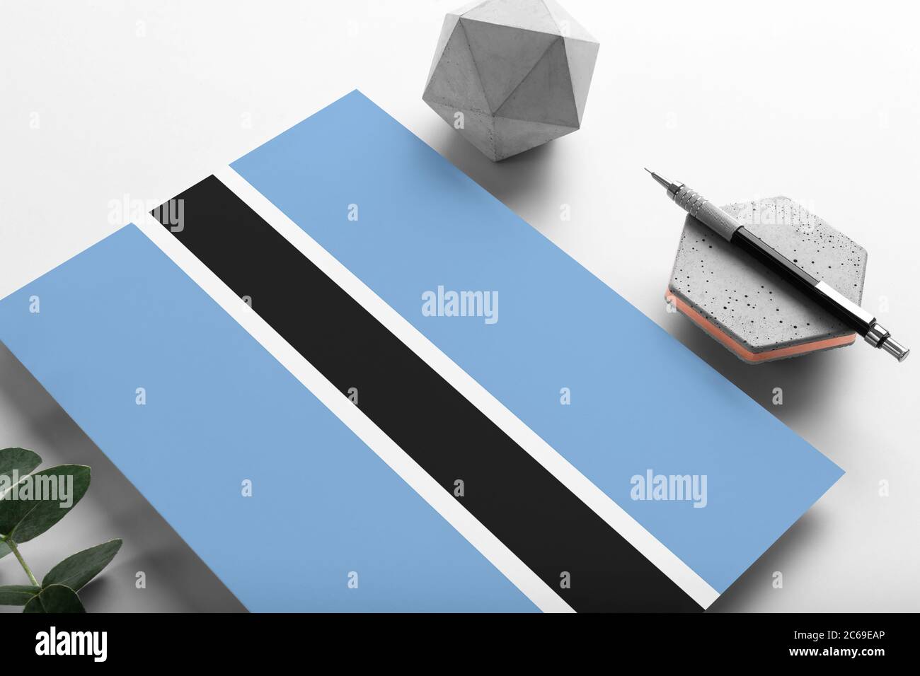 Botswana flag on minimalist paper background. National invitation ...