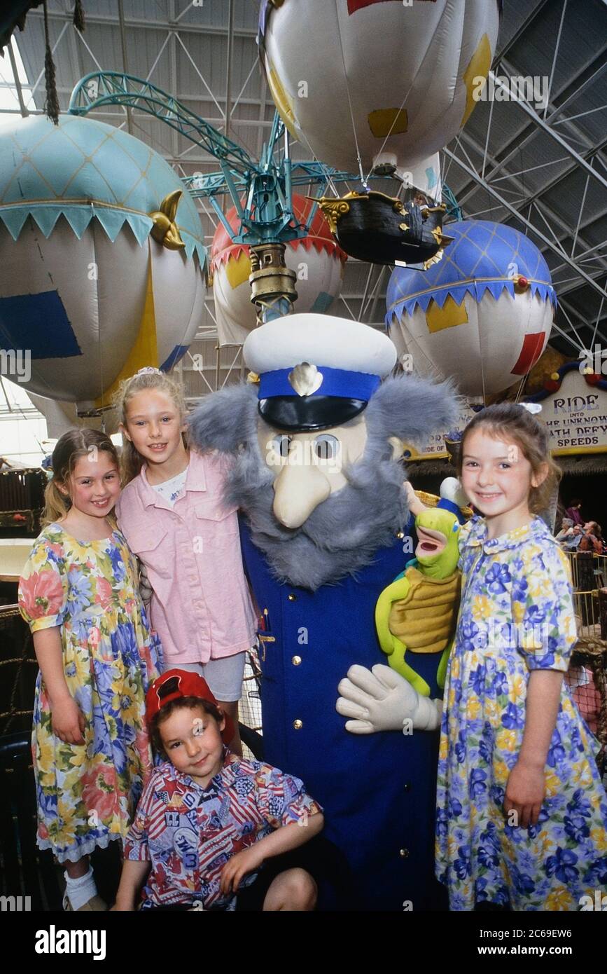 Captain Rhombus mascot surrounded by children at The balloon Ride ...