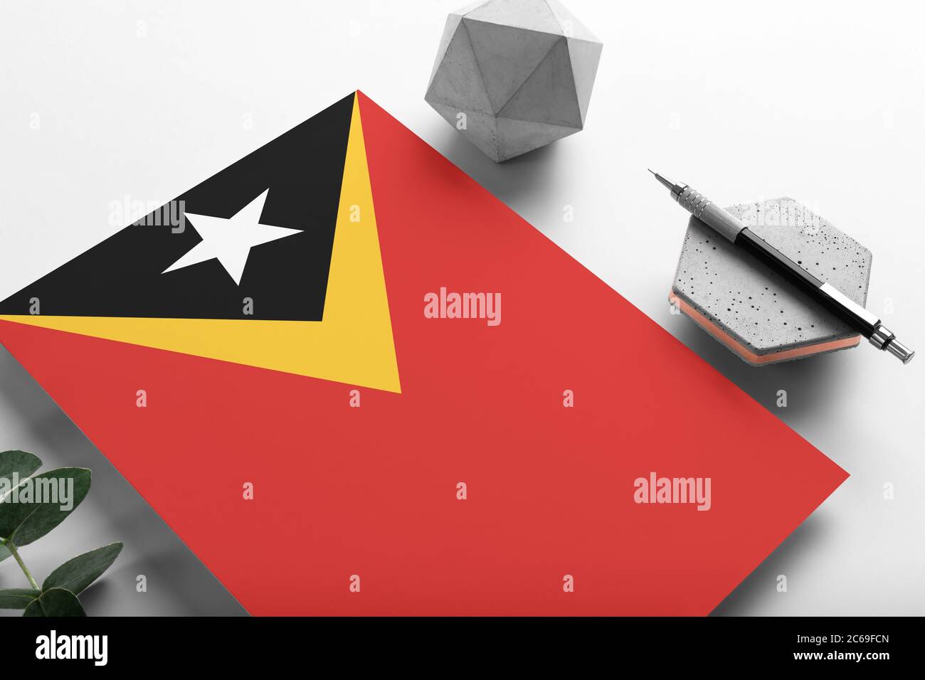 East Timor flag on minimalist paper background. National invitation ...