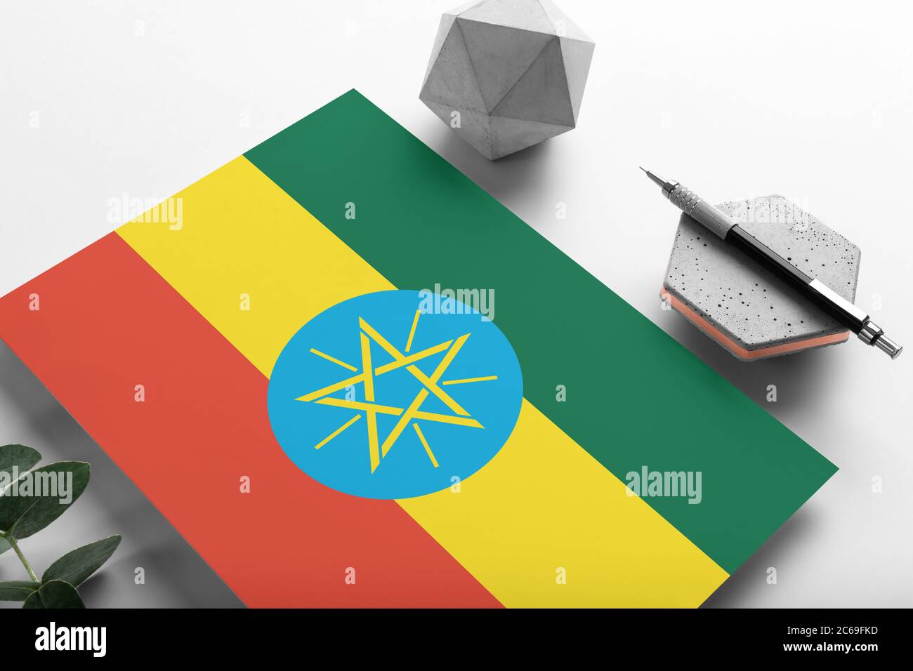 Ethiopia flag on minimalist paper background. National invitation ...