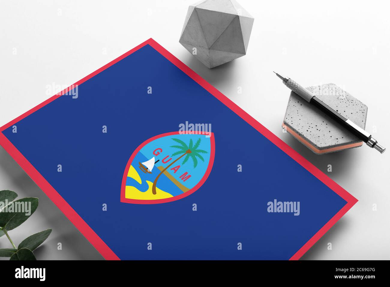 Guam flag on minimalist paper background. National invitation letter ...