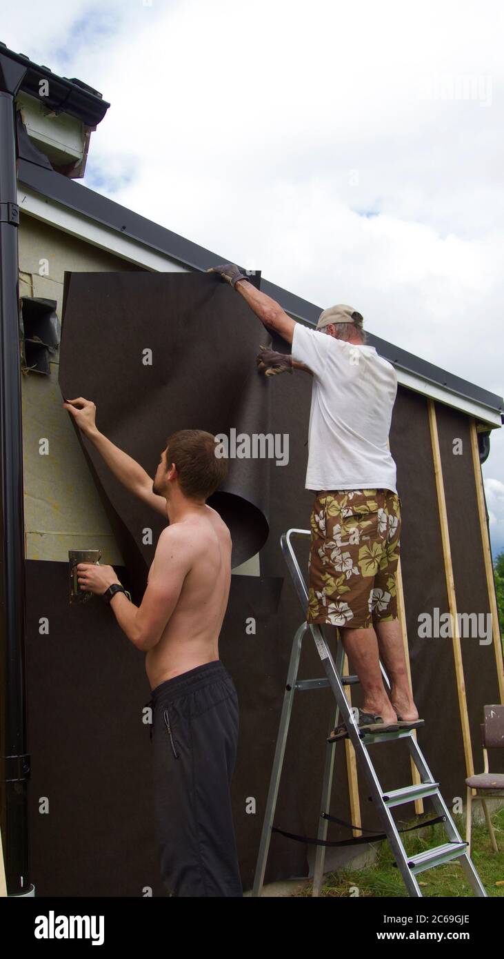 Son helping father home improvement hi-res stock photography and images ...