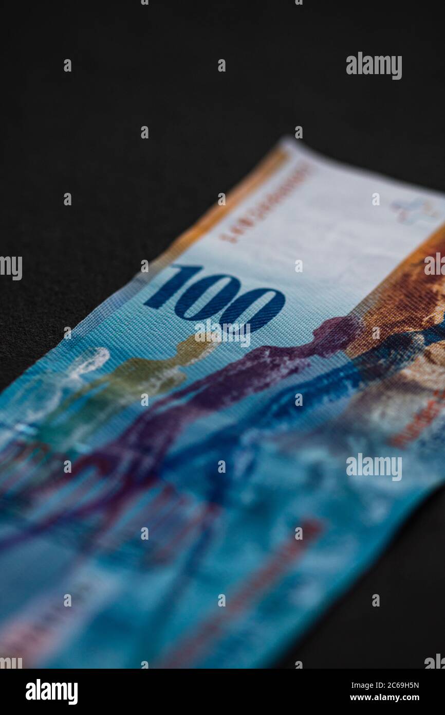 Selective focus on detail of 100 swiss franc banknote. Close up macro ...