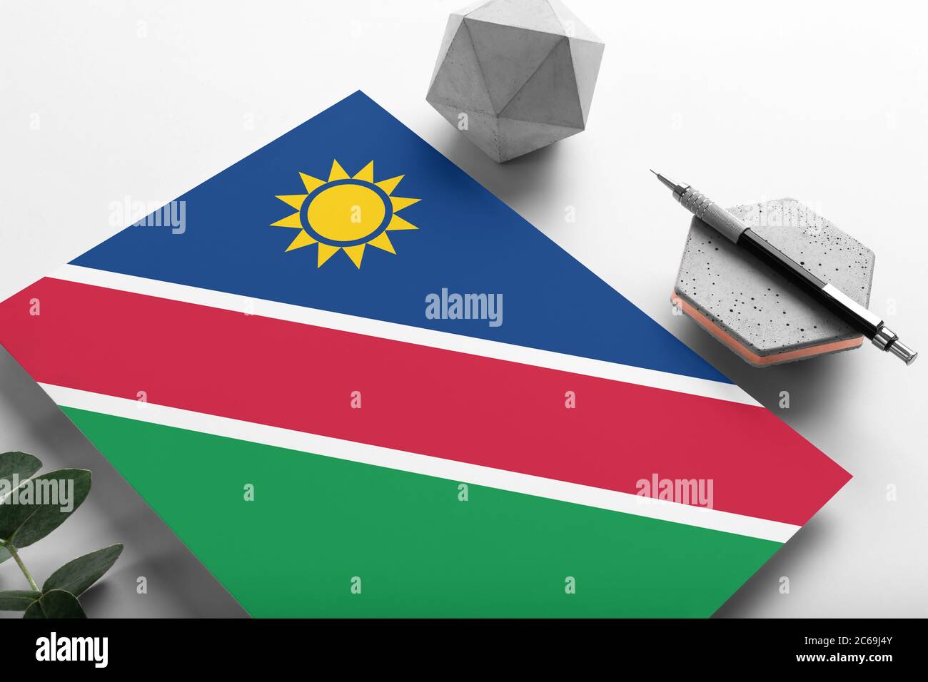 Namibia flag on minimalist paper background. National invitation letter ...