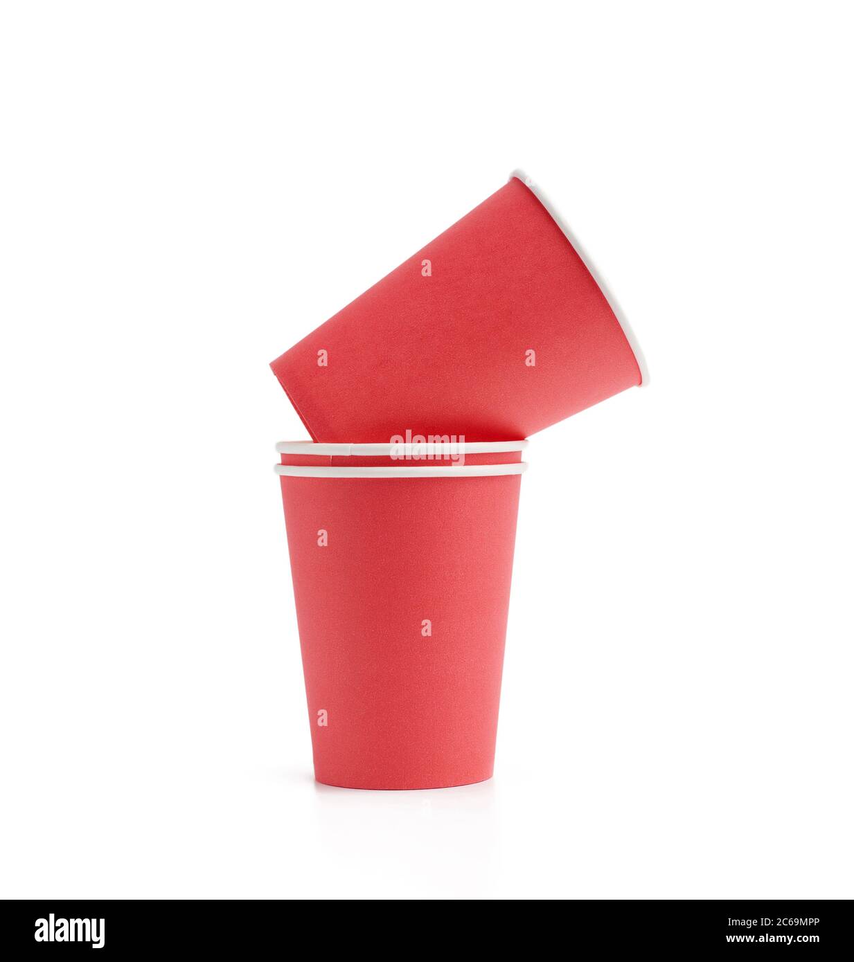 stack of red paper cups for hot takeaway drinks isolated on a white ...