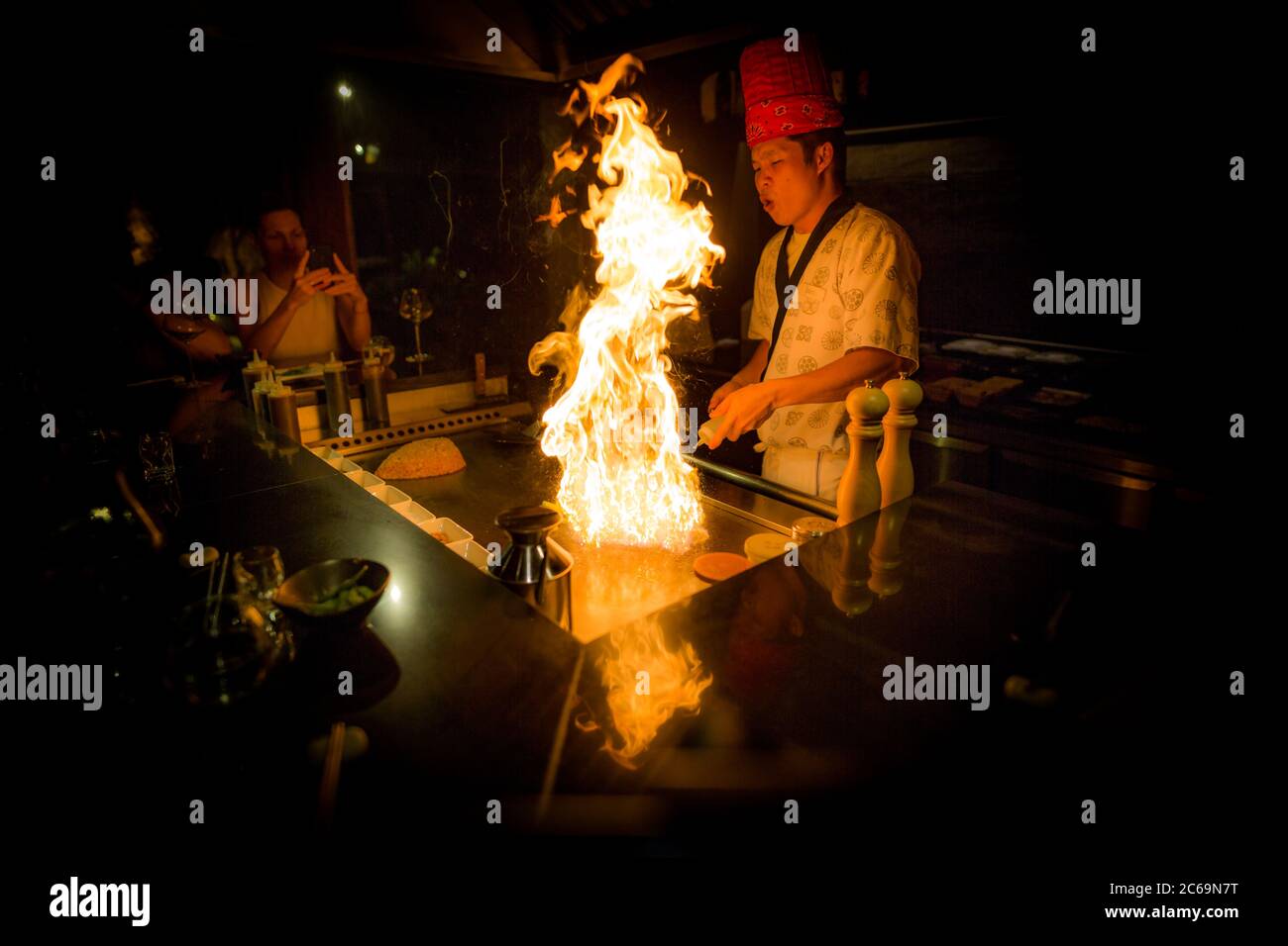 May, 2018 - Ari Atoll, Maldives: Happy teppanyaki chef cooking ...