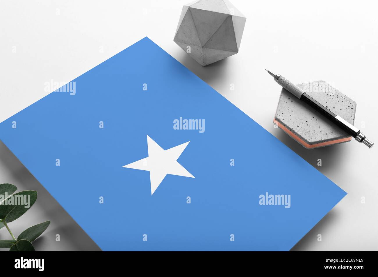 Somalia flag on minimalist paper background. National invitation letter ...