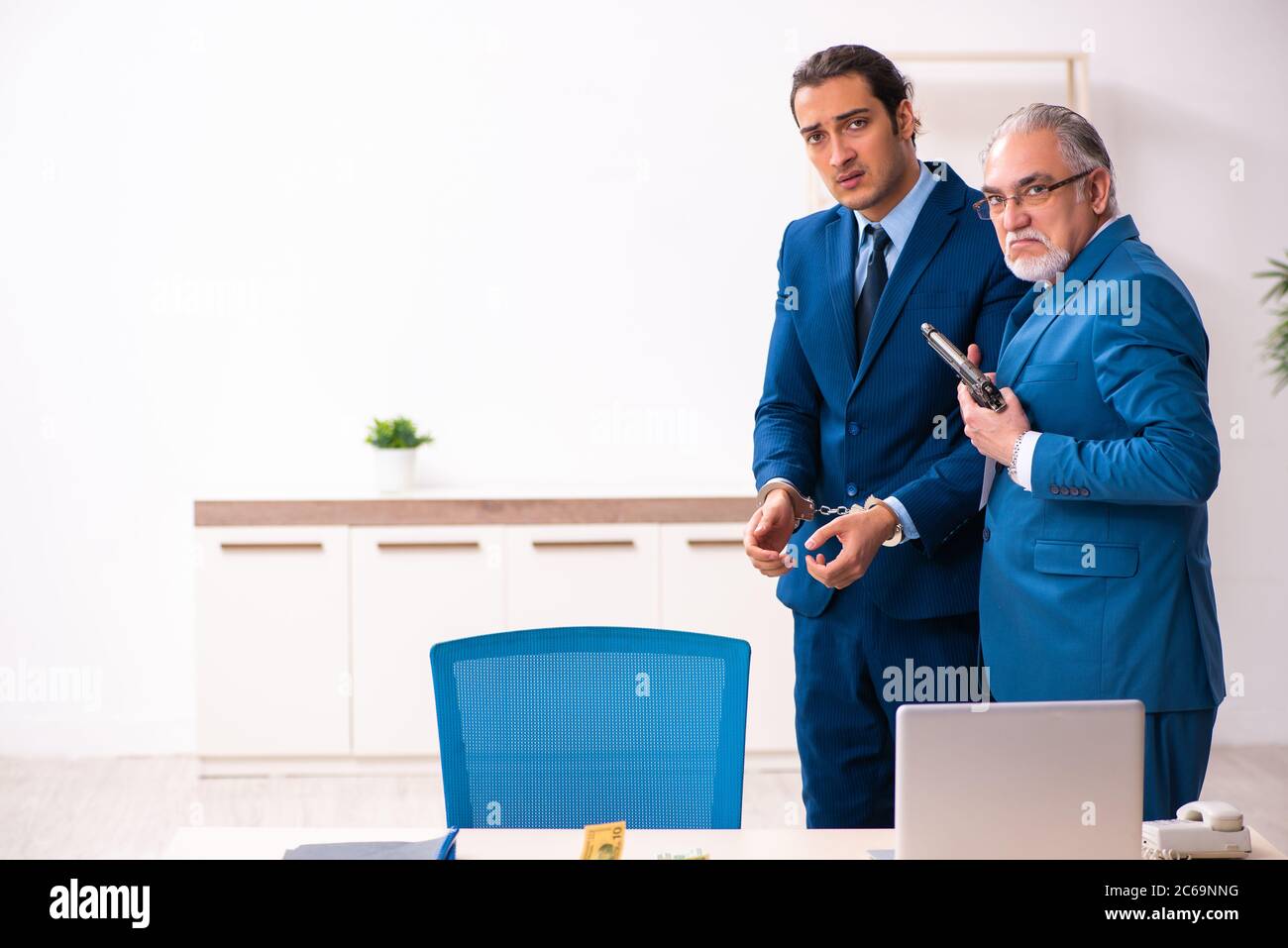 Arresting suspect gun hi-res stock photography and images - Alamy