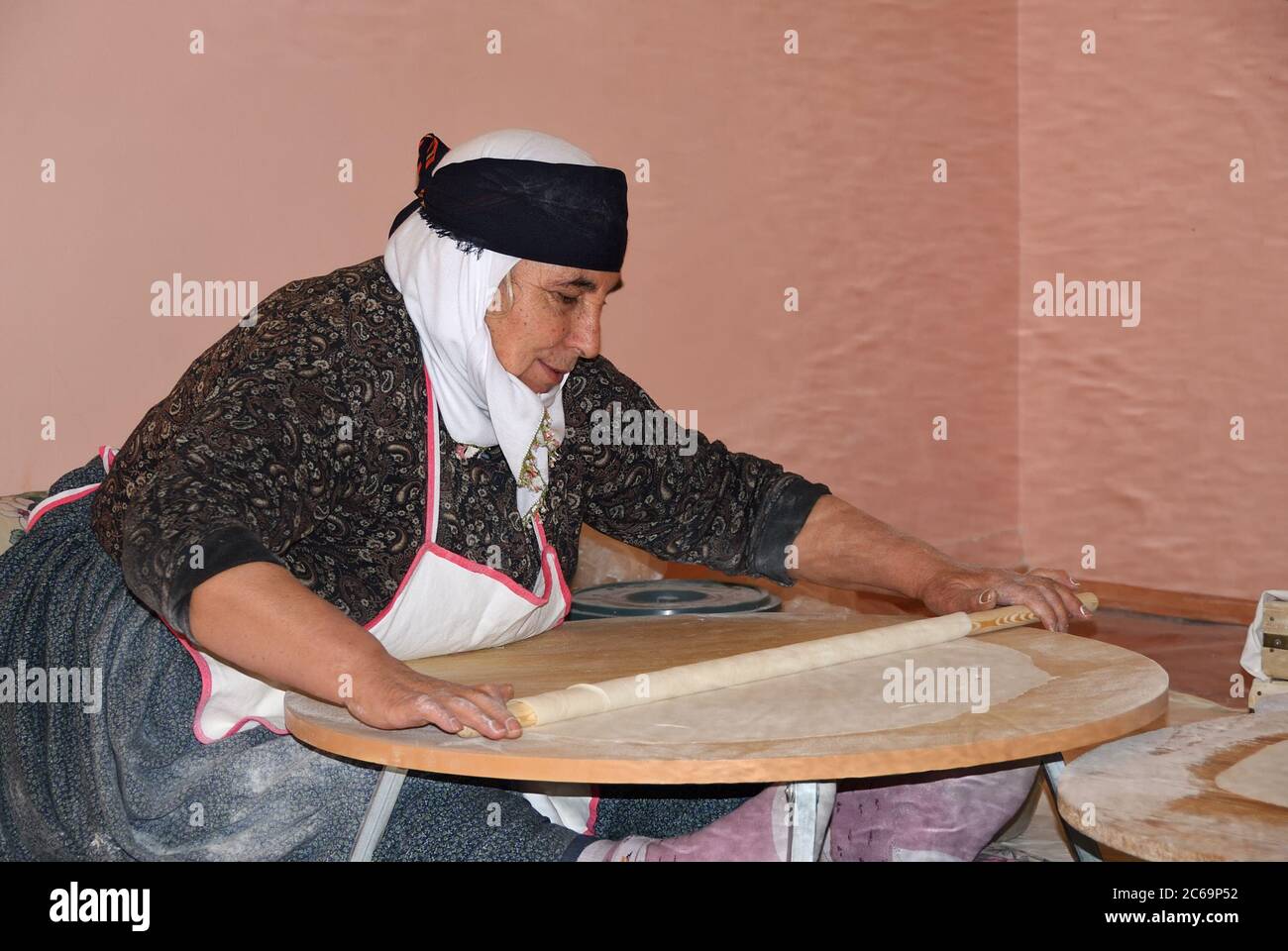 Konya, Turkey - November 10, 2009: A eldery turkish woman preparing ...