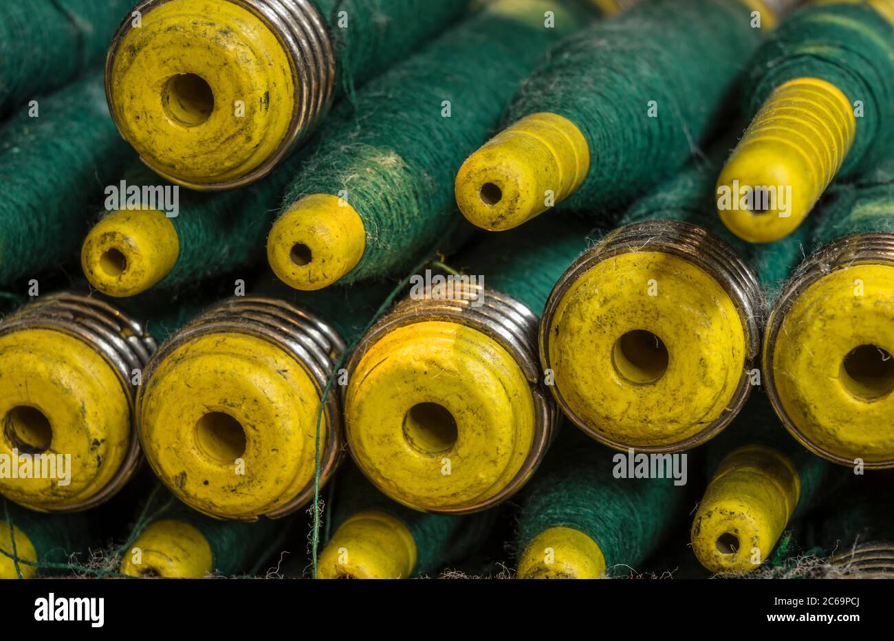 Yarn spools in a textile factory hi-res stock photography and images ...