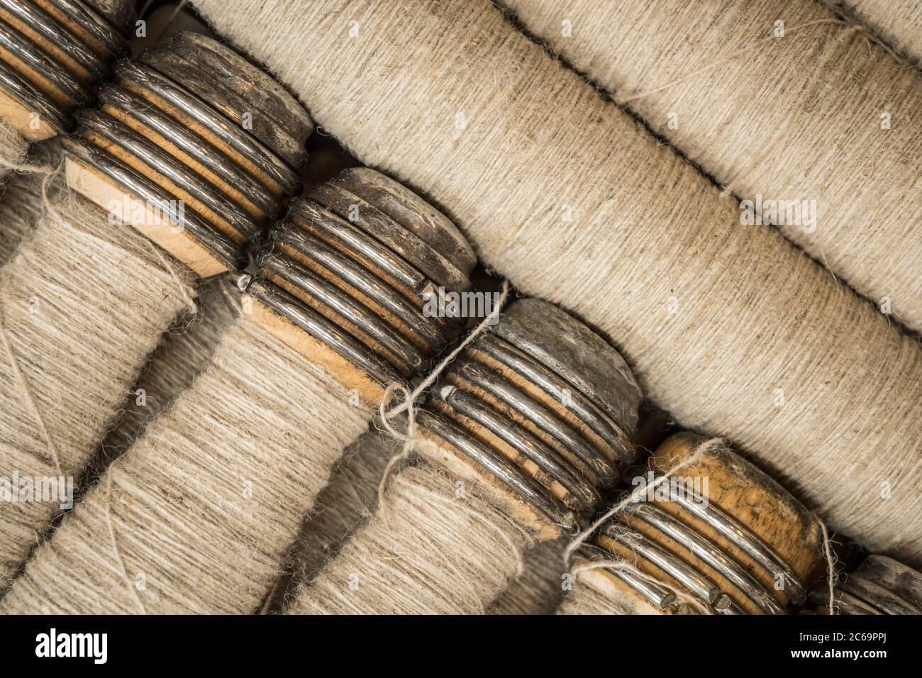 spools with thread for using in a loom Stock Photo - Alamy