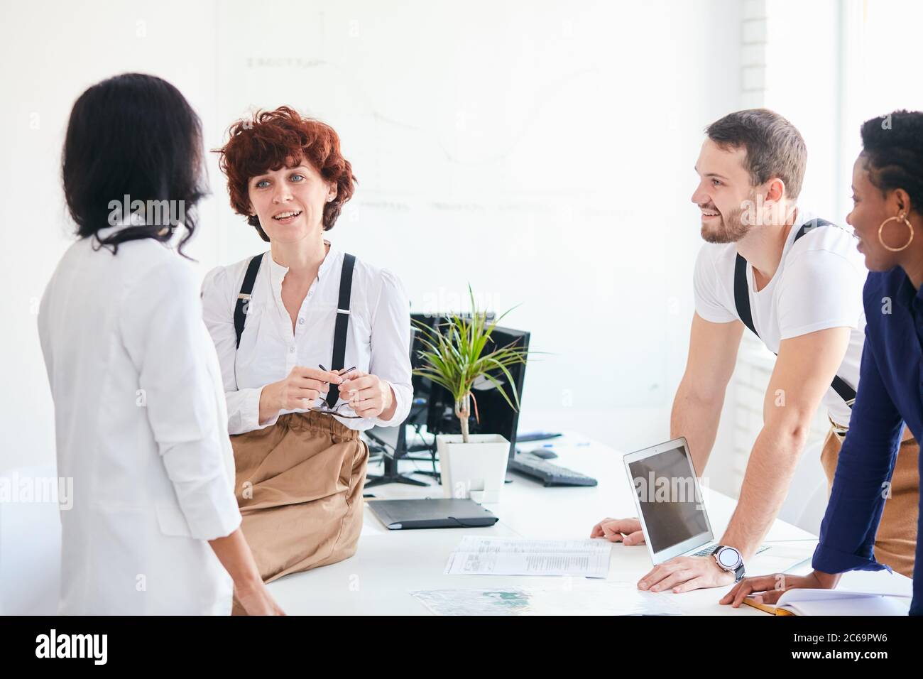 Happy team meeting. Cooperation of colleagues after business training ...