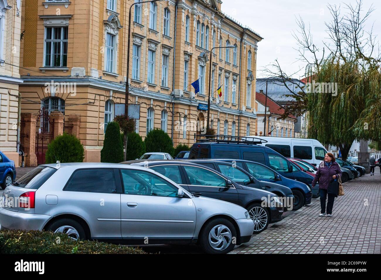 Parked cars along the street in downtown of Lugoj, Romania, 2020 Stock ...
