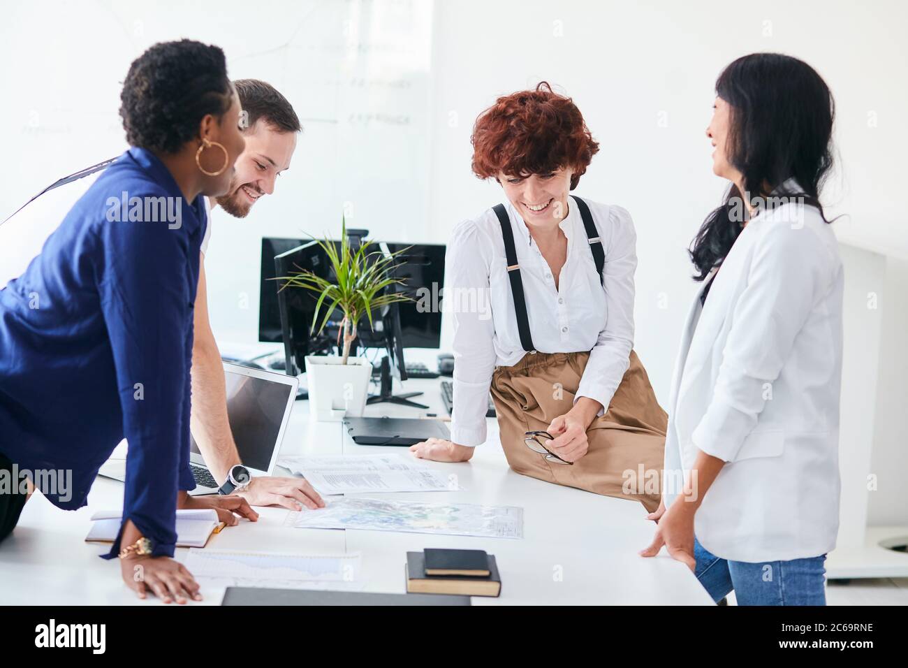 Happy team meeting. Cooperation of colleagues after business training ...